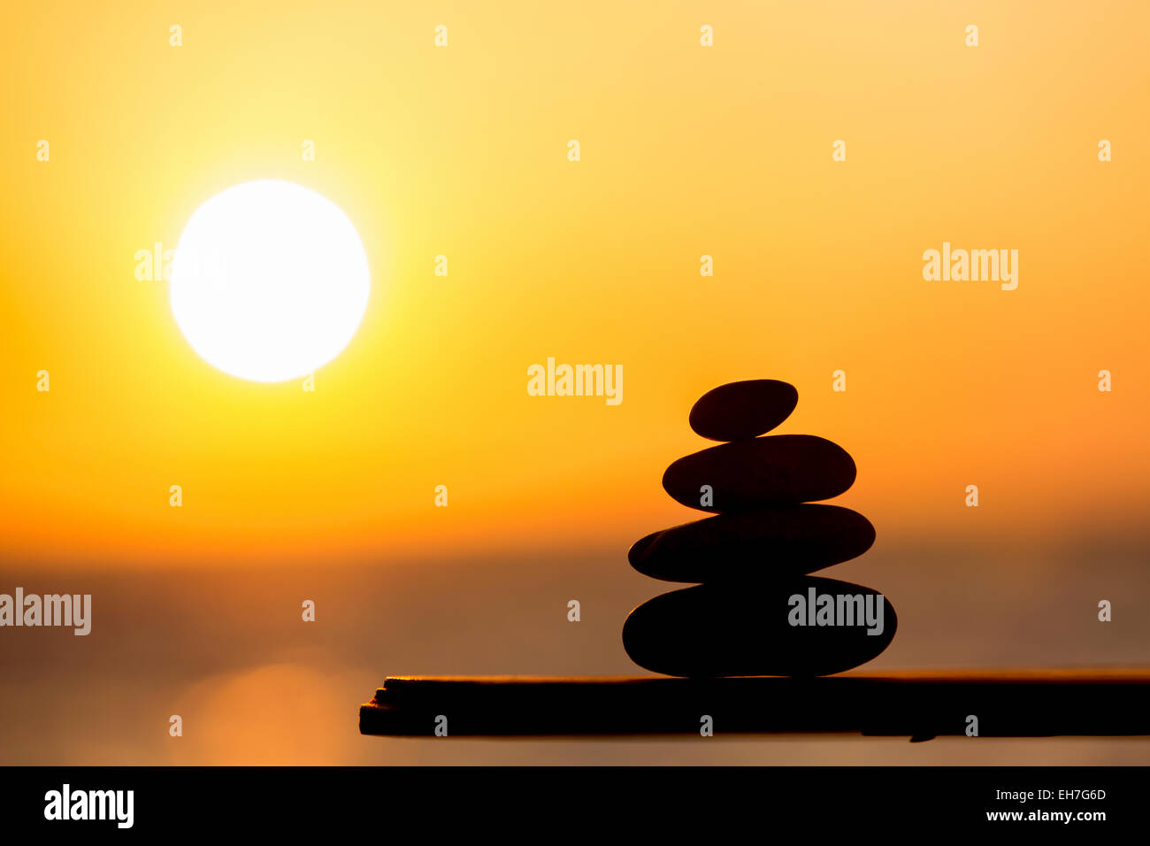 Pile of stone at sunset Stock Photo - Alamy