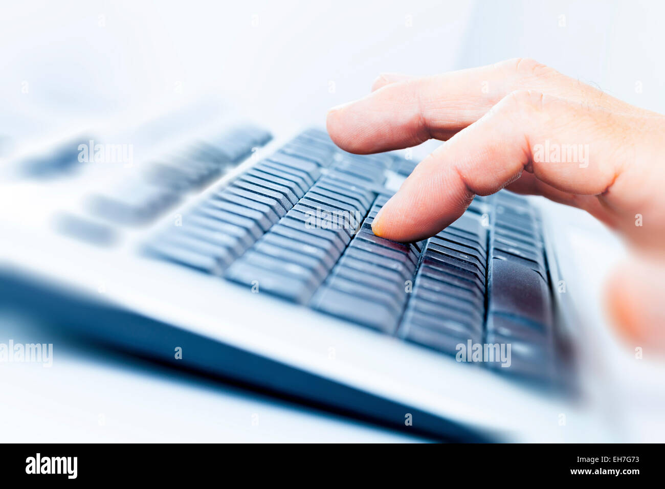 Person using a computer keyboard Stock Photo - Alamy