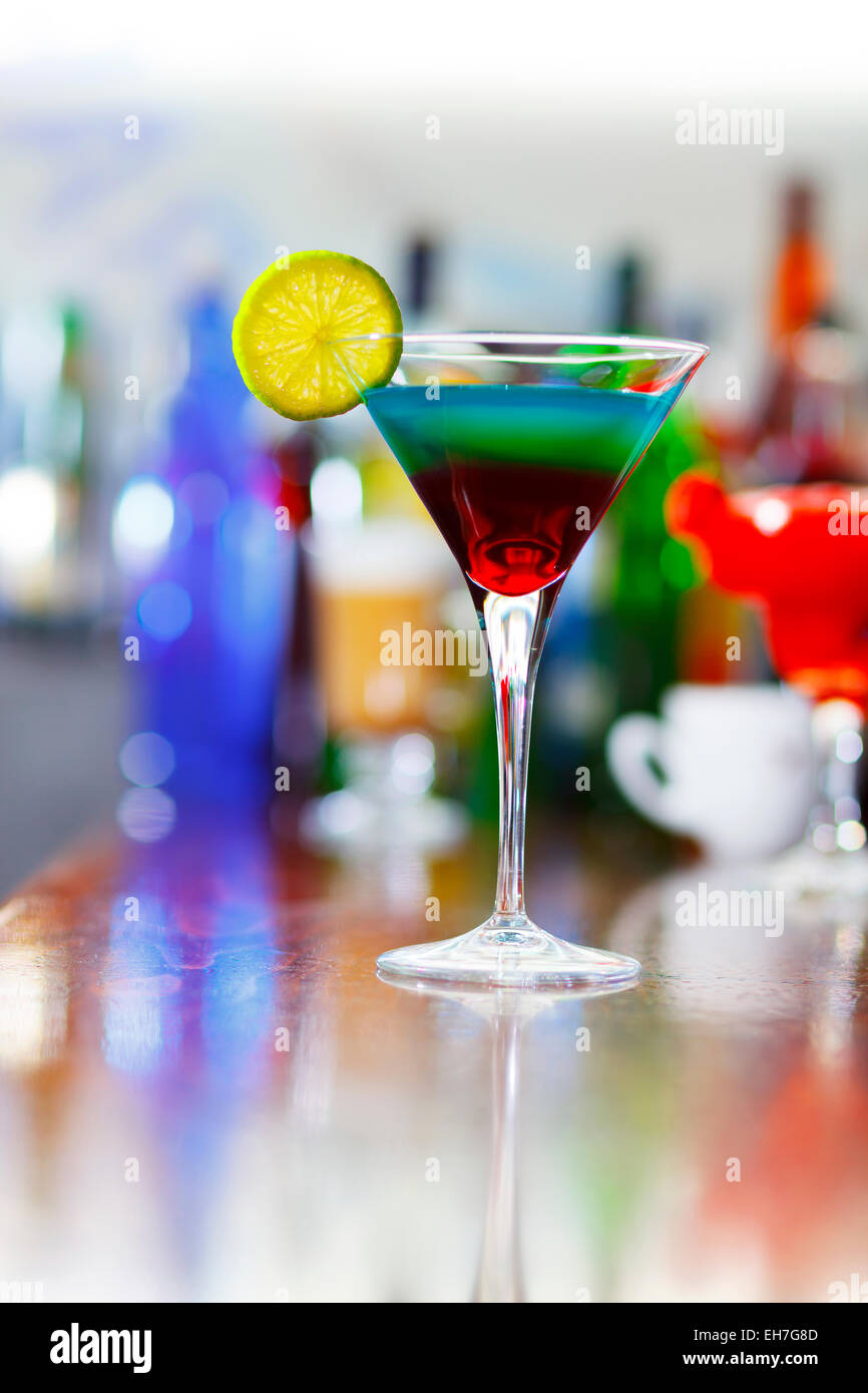 Cocktail glass on a bar Stock Photo - Alamy