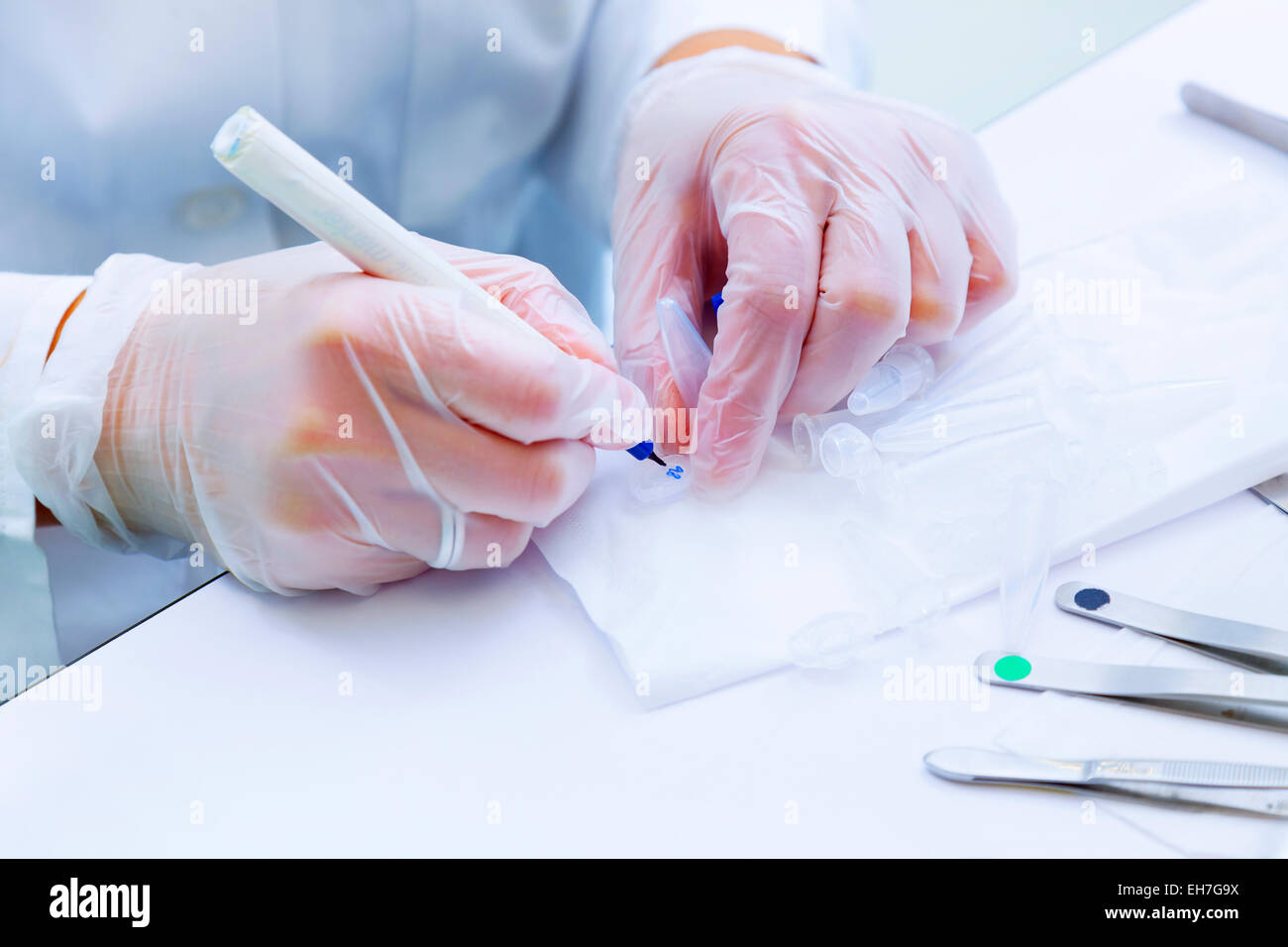 Laboratory technician writing on hi-res stock photography and images ...