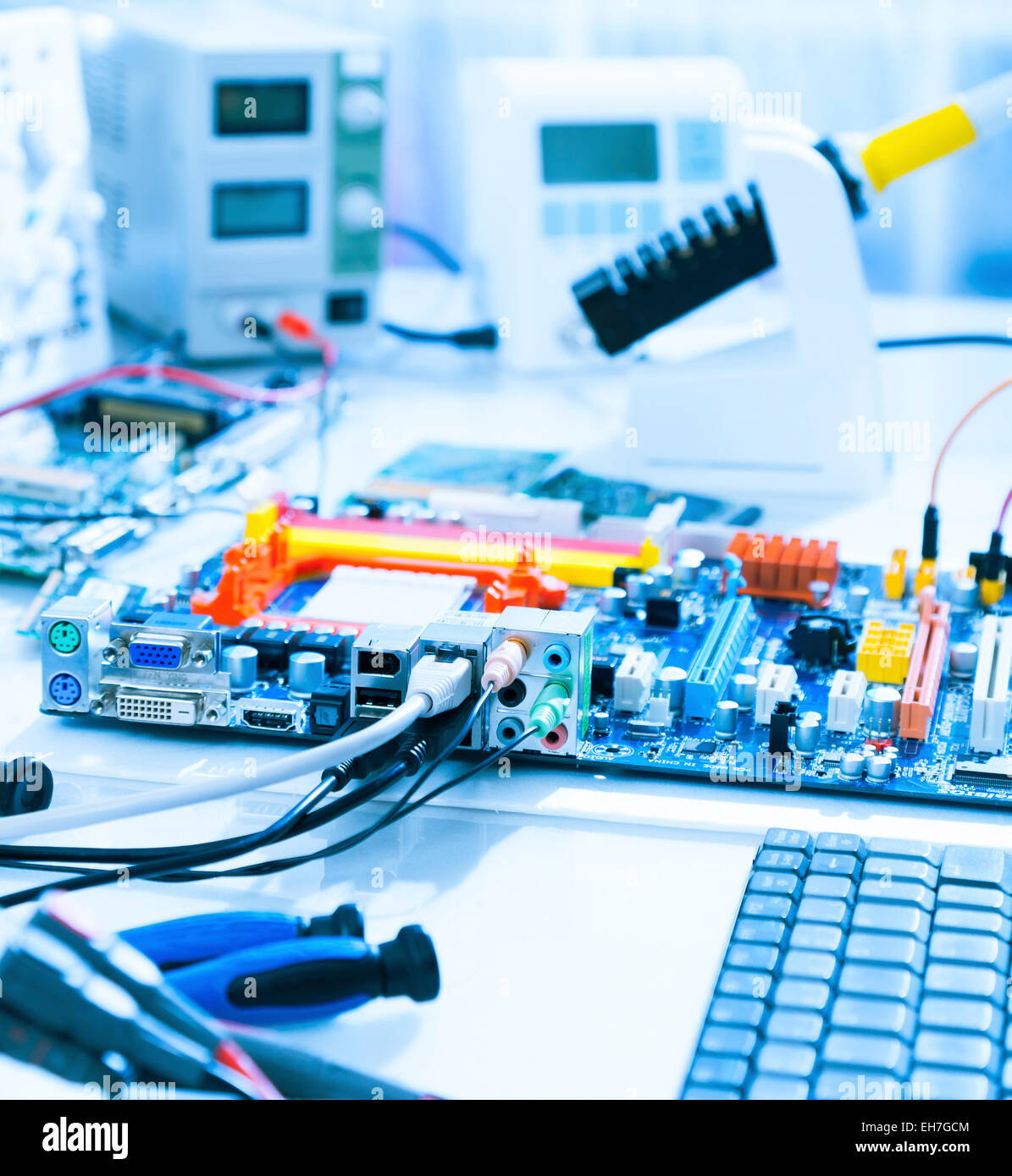 Computers in a repair workshop Stock Photo - Alamy