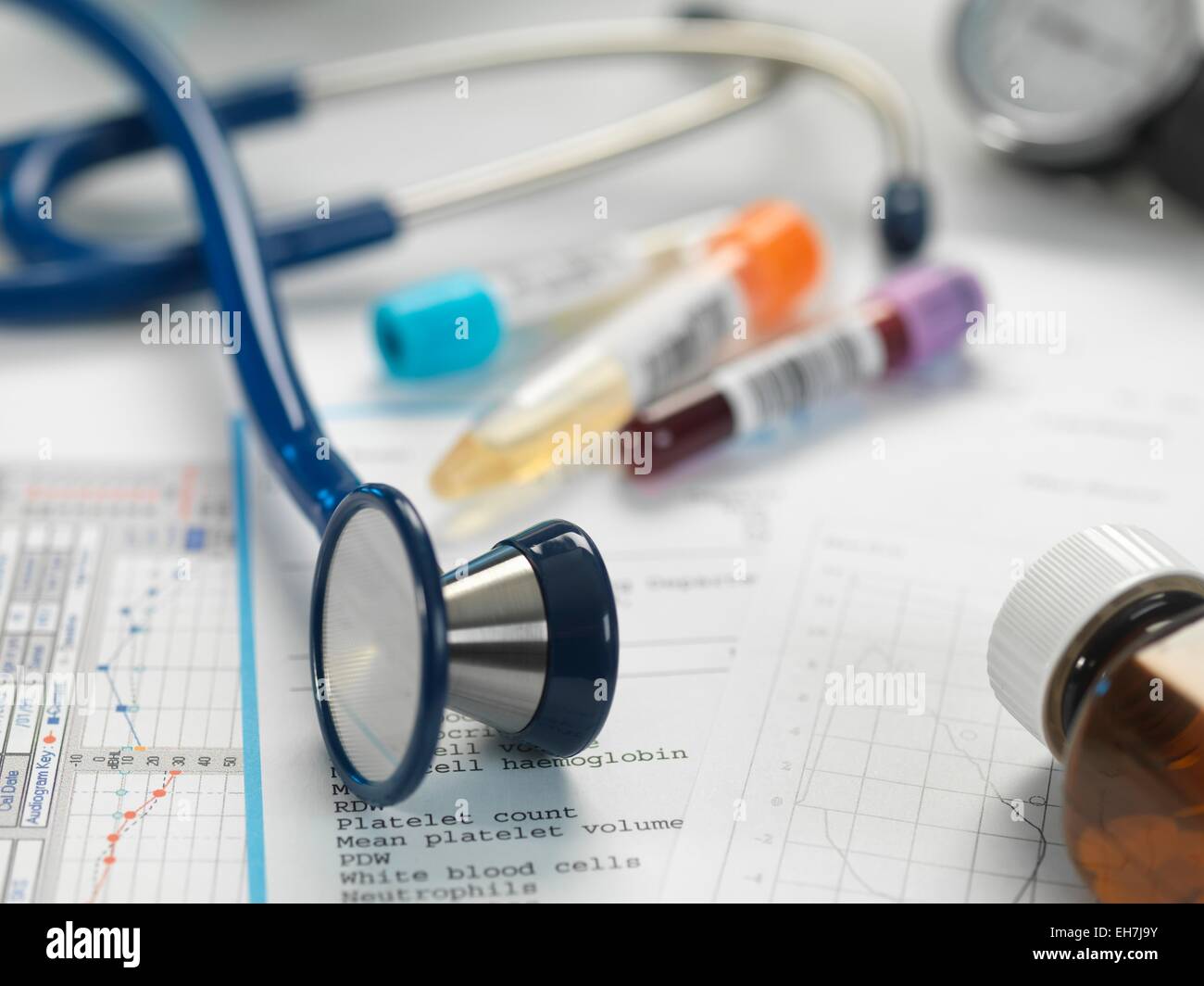 Vials, stethoscope and paperwork Stock Photo - Alamy