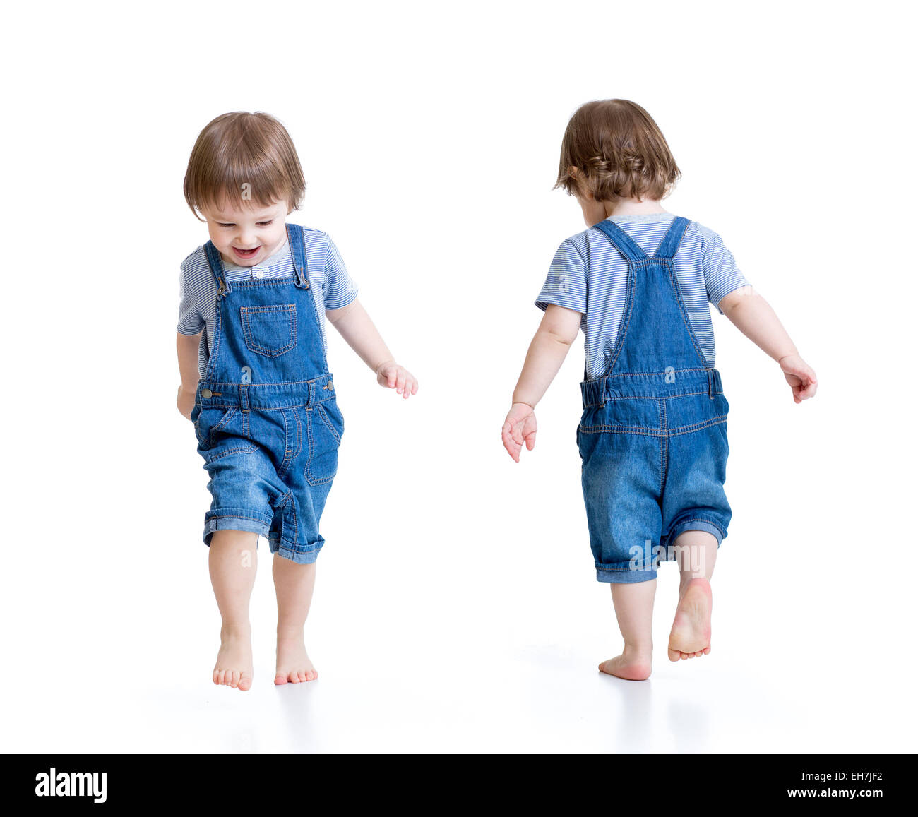 Happy little boy running. Front and rear view Stock Photo - Alamy