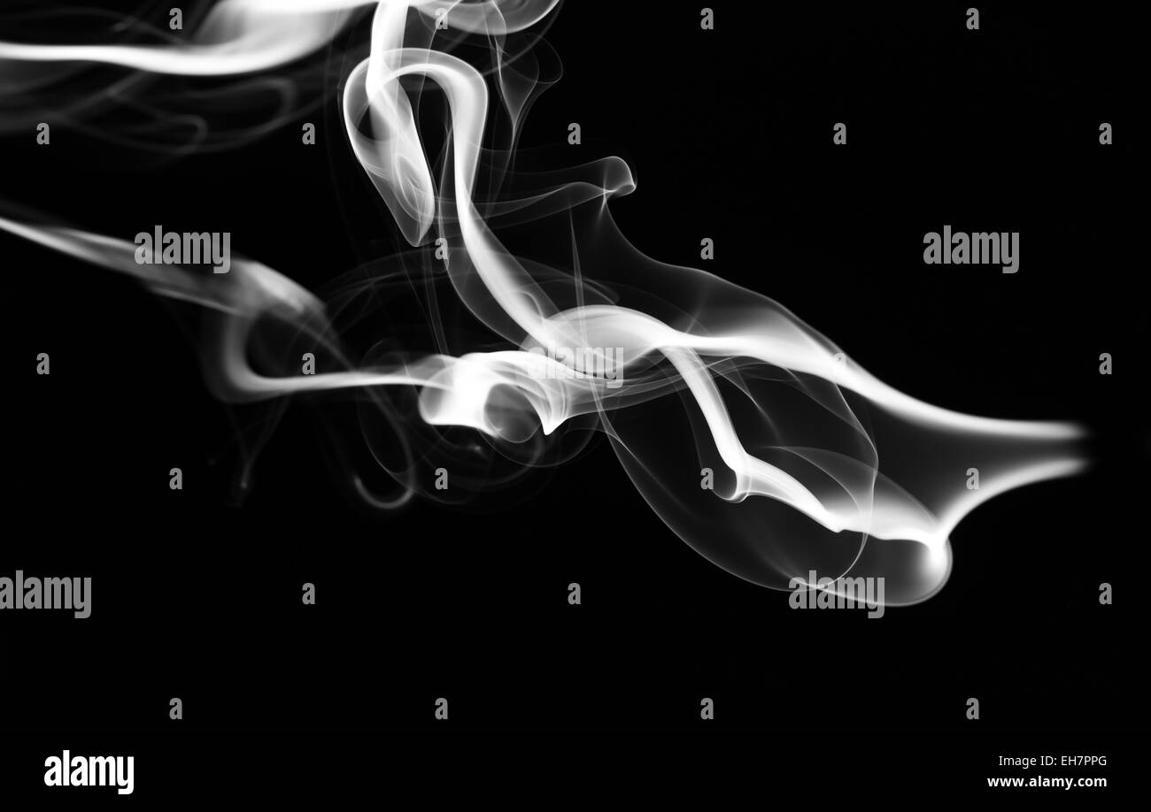 Abstract white fume pattern and shape over black background Stock Photo ...