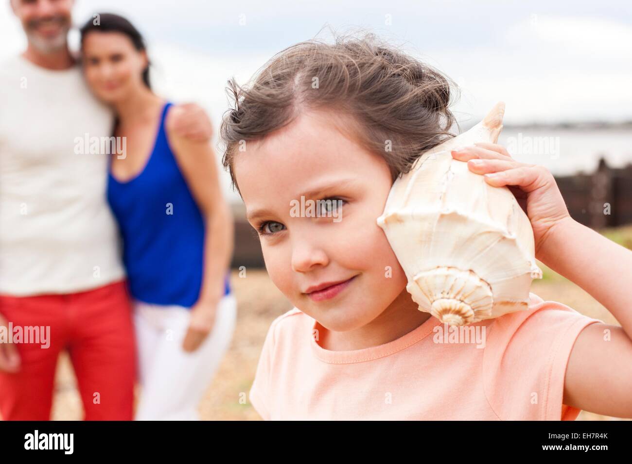 Girl with seashell Stock Photo - Alamy
