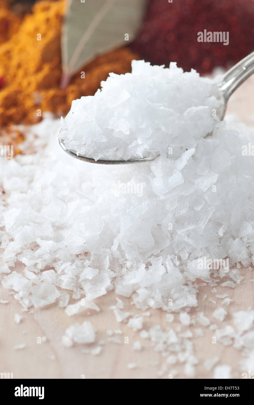 A spoon of sea salt flakes Stock Photo - Alamy