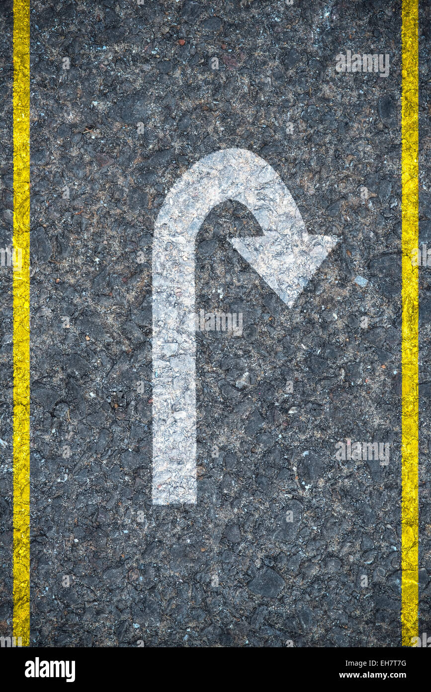 Asphalt line yellow and u trun of a road Stock Photo - Alamy