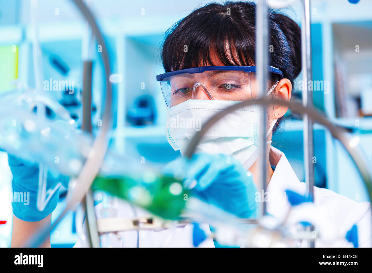 Female chemist in lab Stock Photo - Alamy