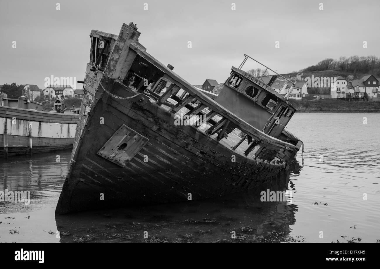 Dacaying fishing boat rotting away at Hooe Lake in Devon Stock Photo ...