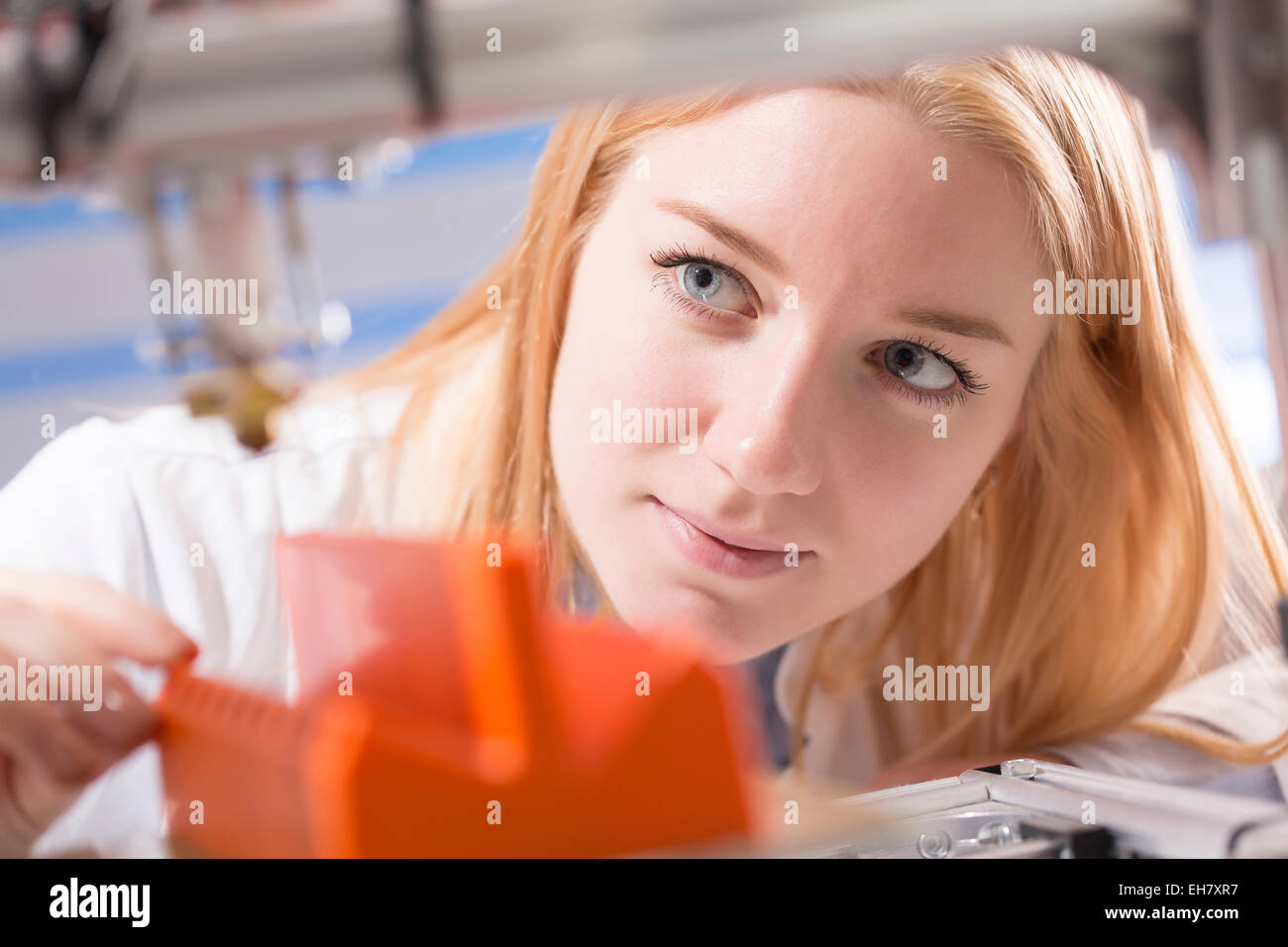 Female student using 3d printer Stock Photo - Alamy