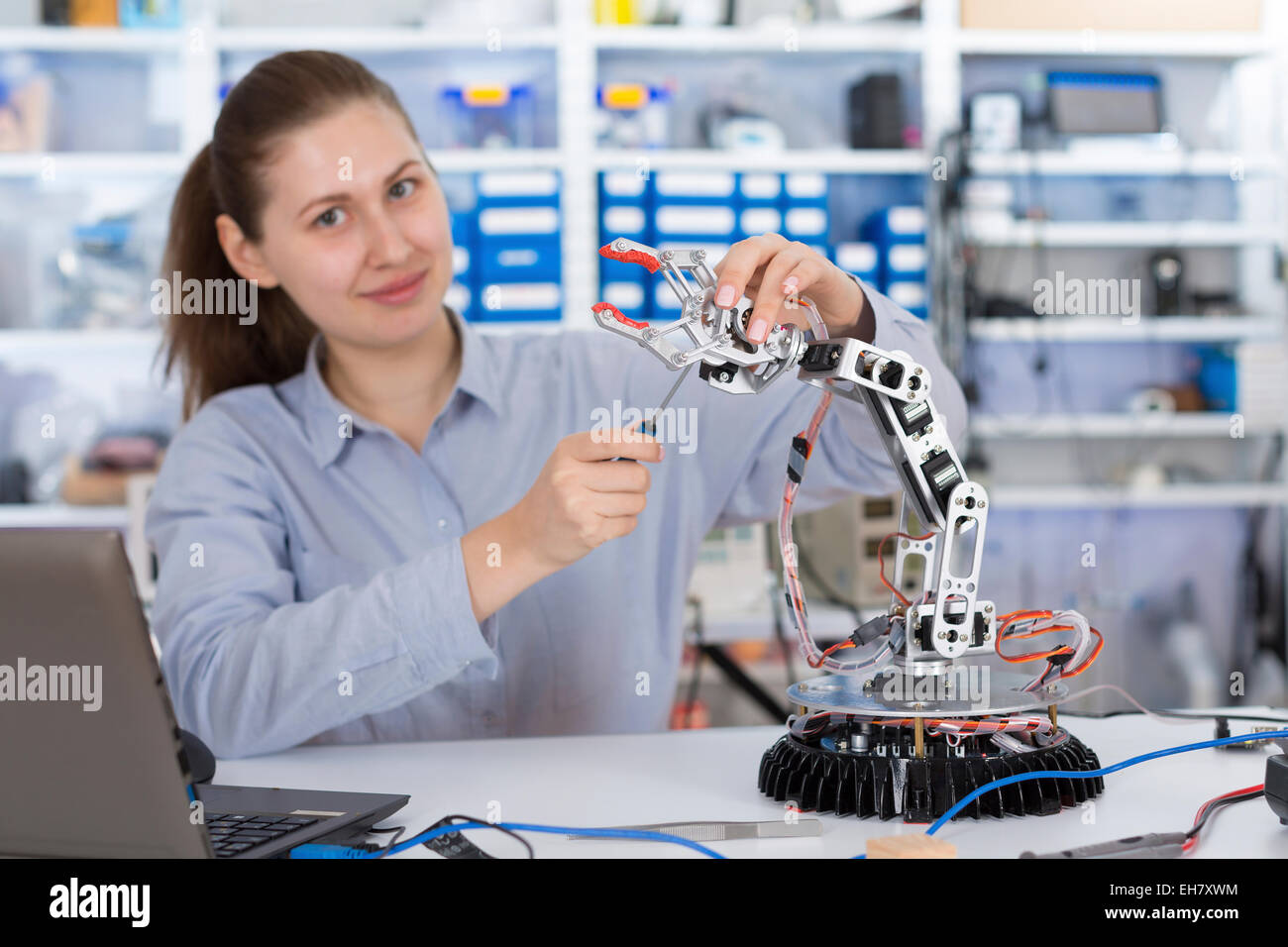 Student repairing robotic equipment Stock Photo - Alamy