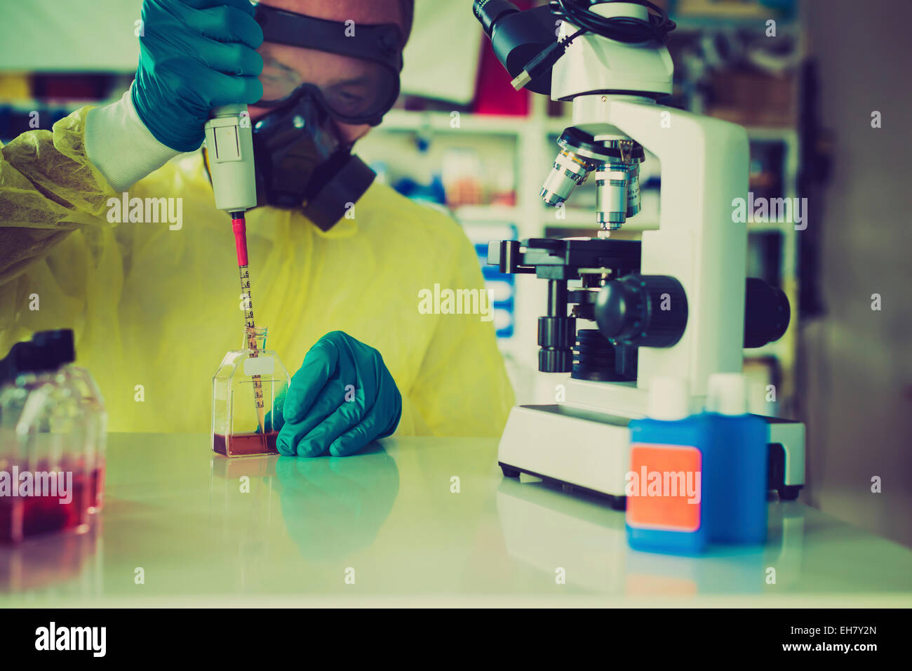 Scientist in hazmat suit Stock Photo - Alamy