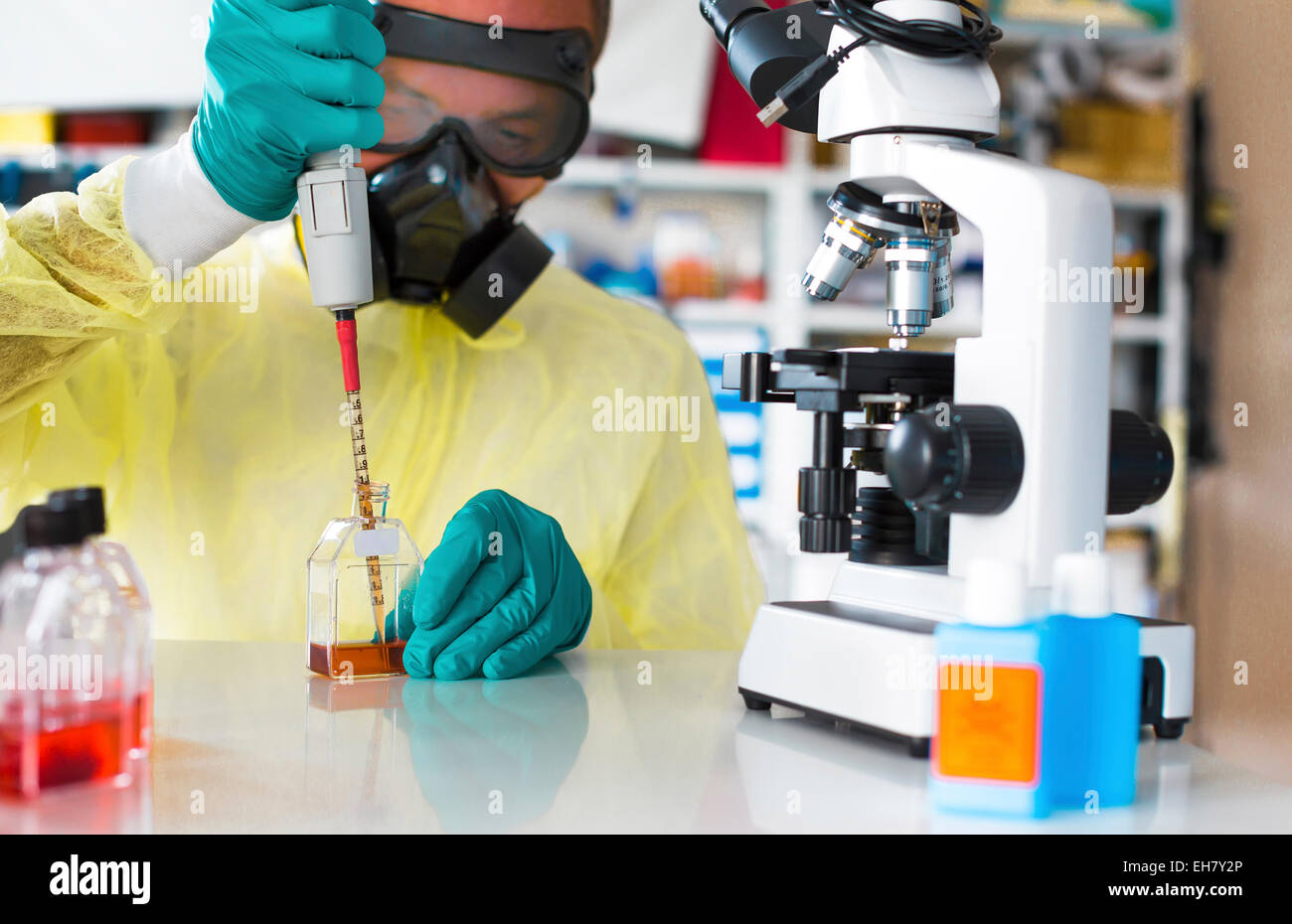 Scientist in hazmat suit Stock Photo - Alamy