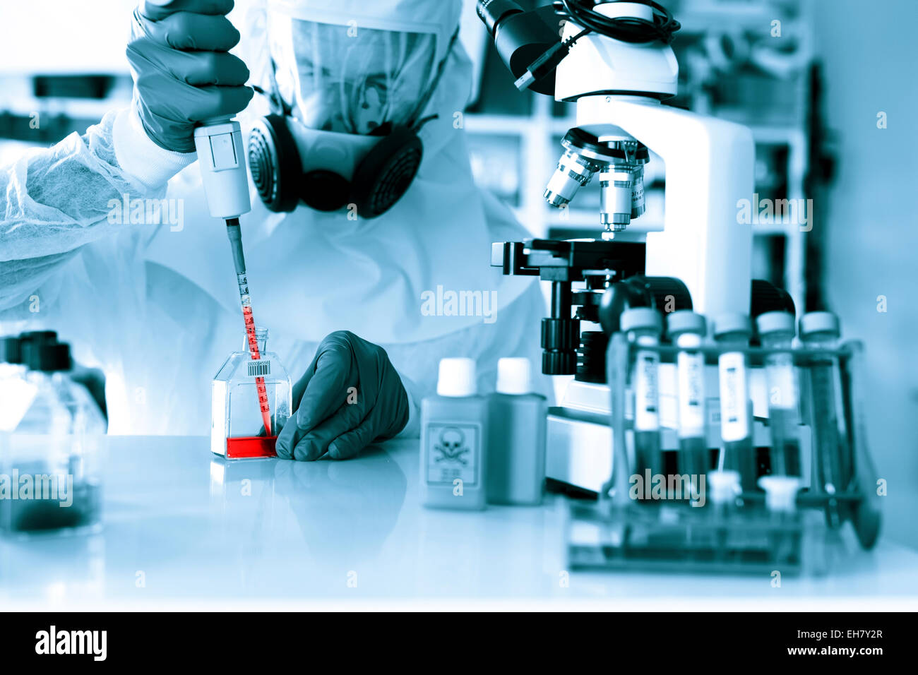 Scientist in hazmat suit Stock Photo - Alamy