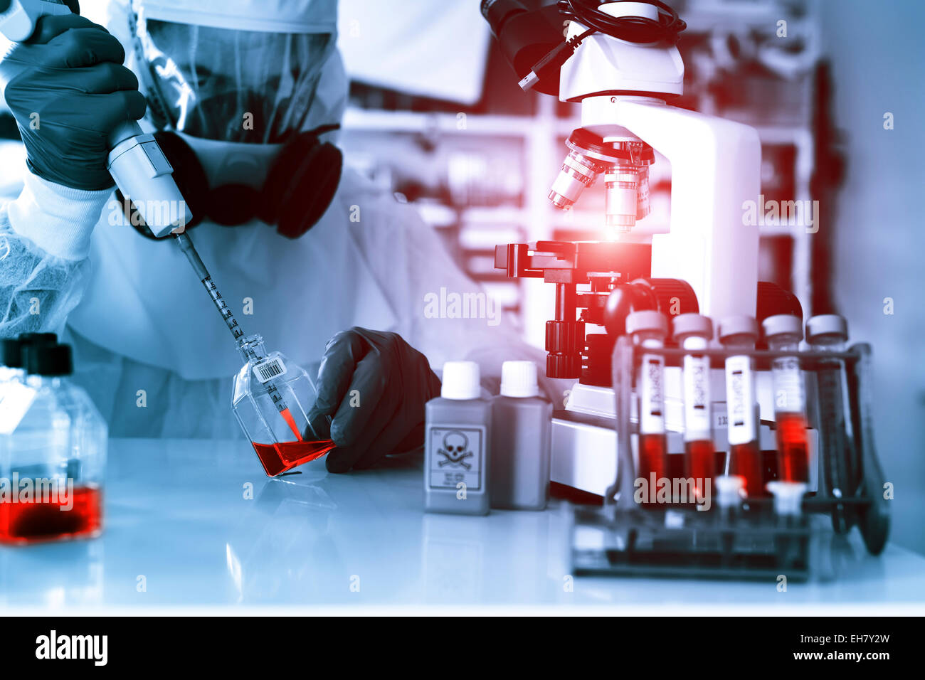Scientist in hazmat suit Stock Photo - Alamy