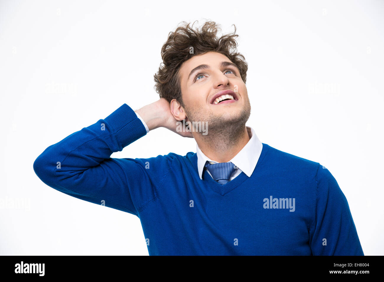 Portrait of a smiling thoughtful business man looking up Stock Photo ...