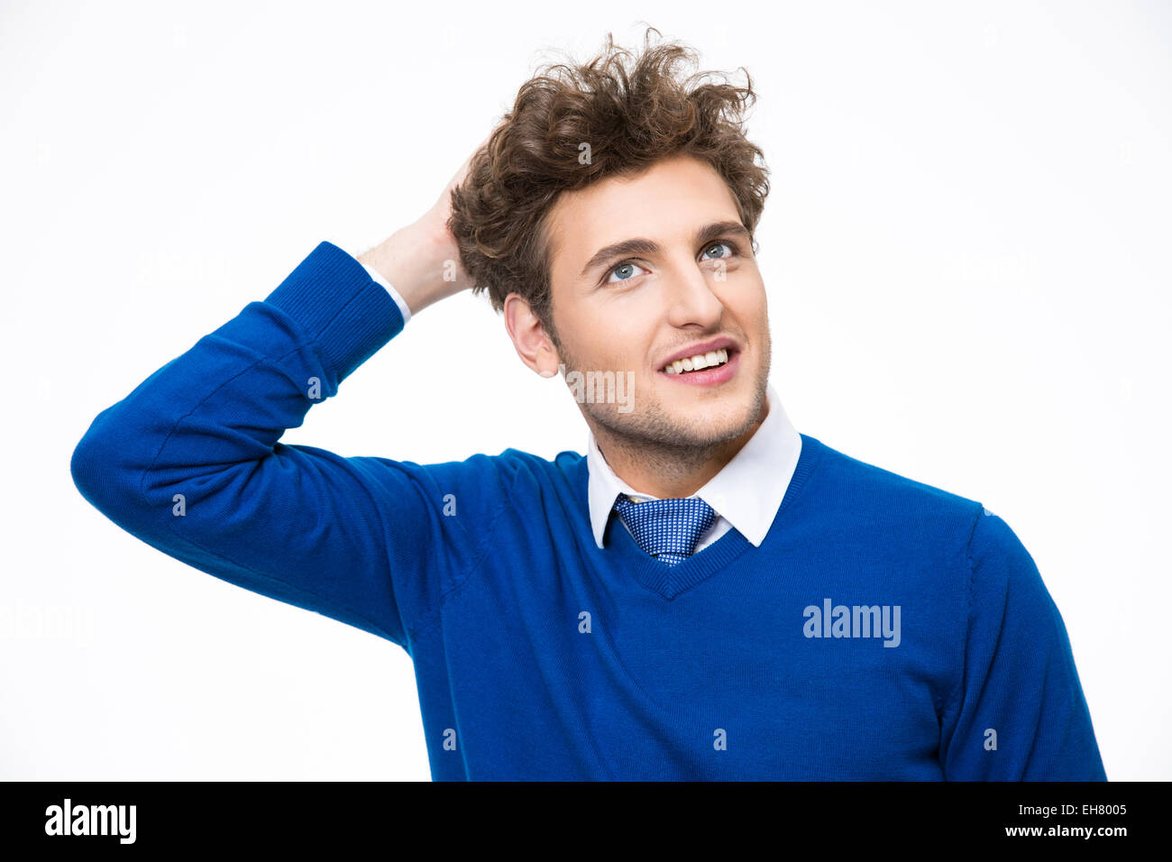 Portrait of a happy thoughtful business man looking up Stock Photo - Alamy