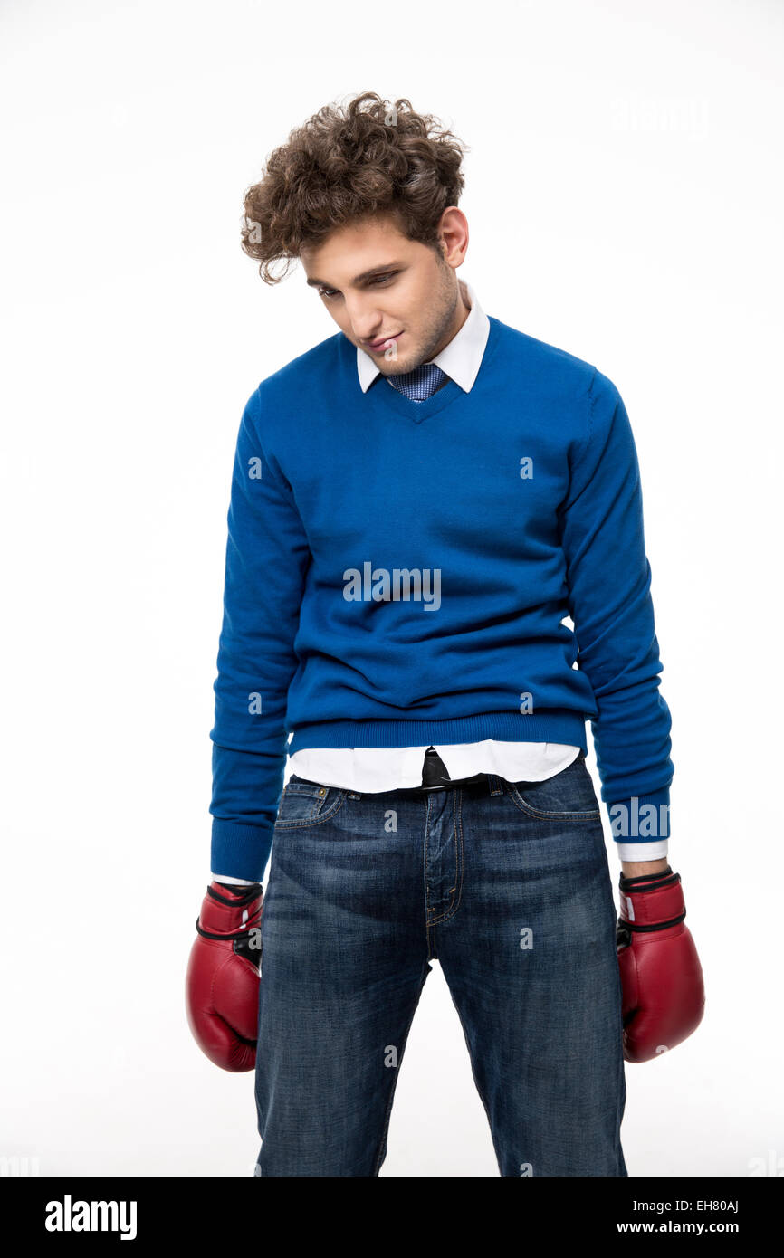 Portrait of a defeated young man over white background Stock Photo - Alamy