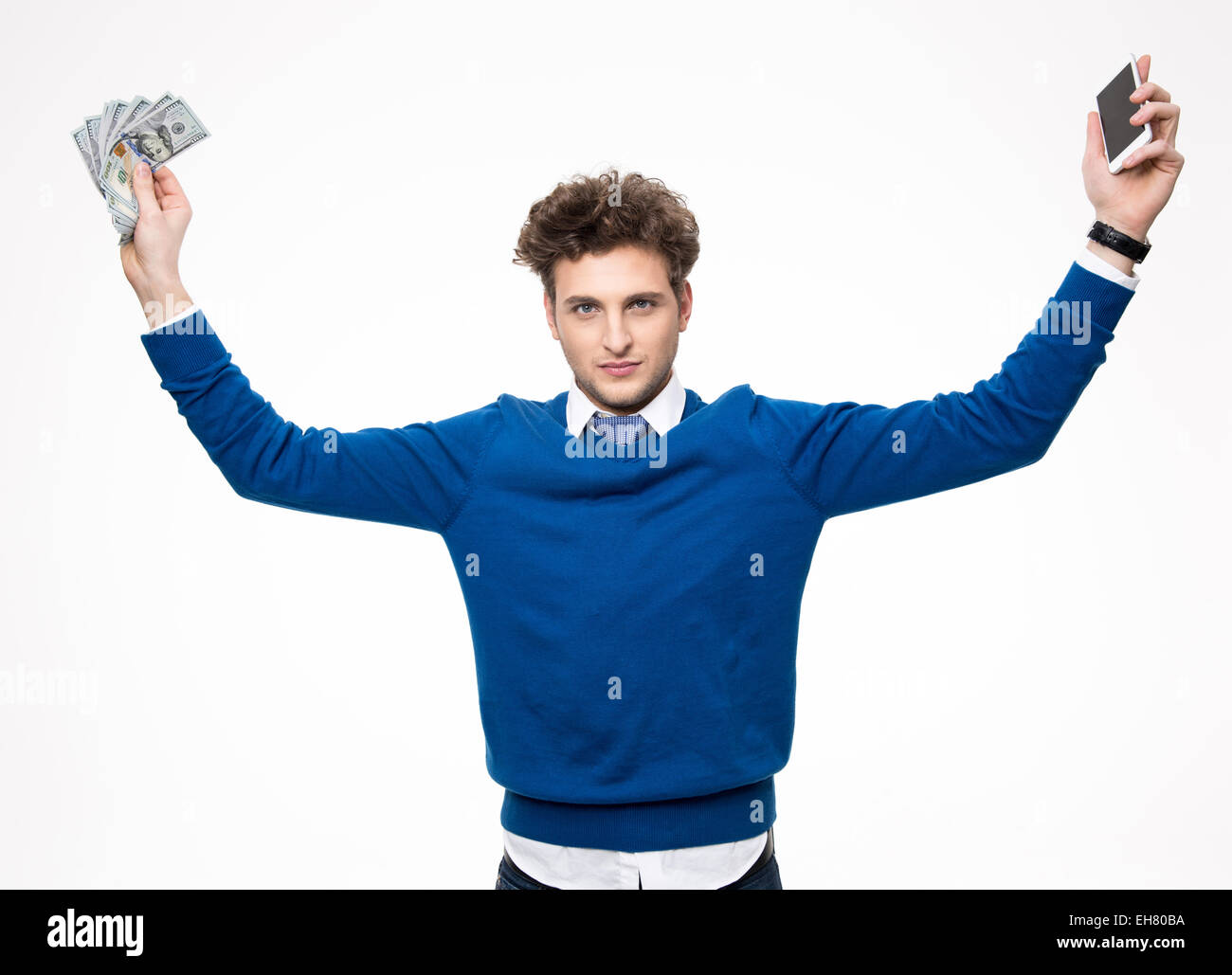 Portrait Of A Handsome Man Holding Smartphone And Money Over White