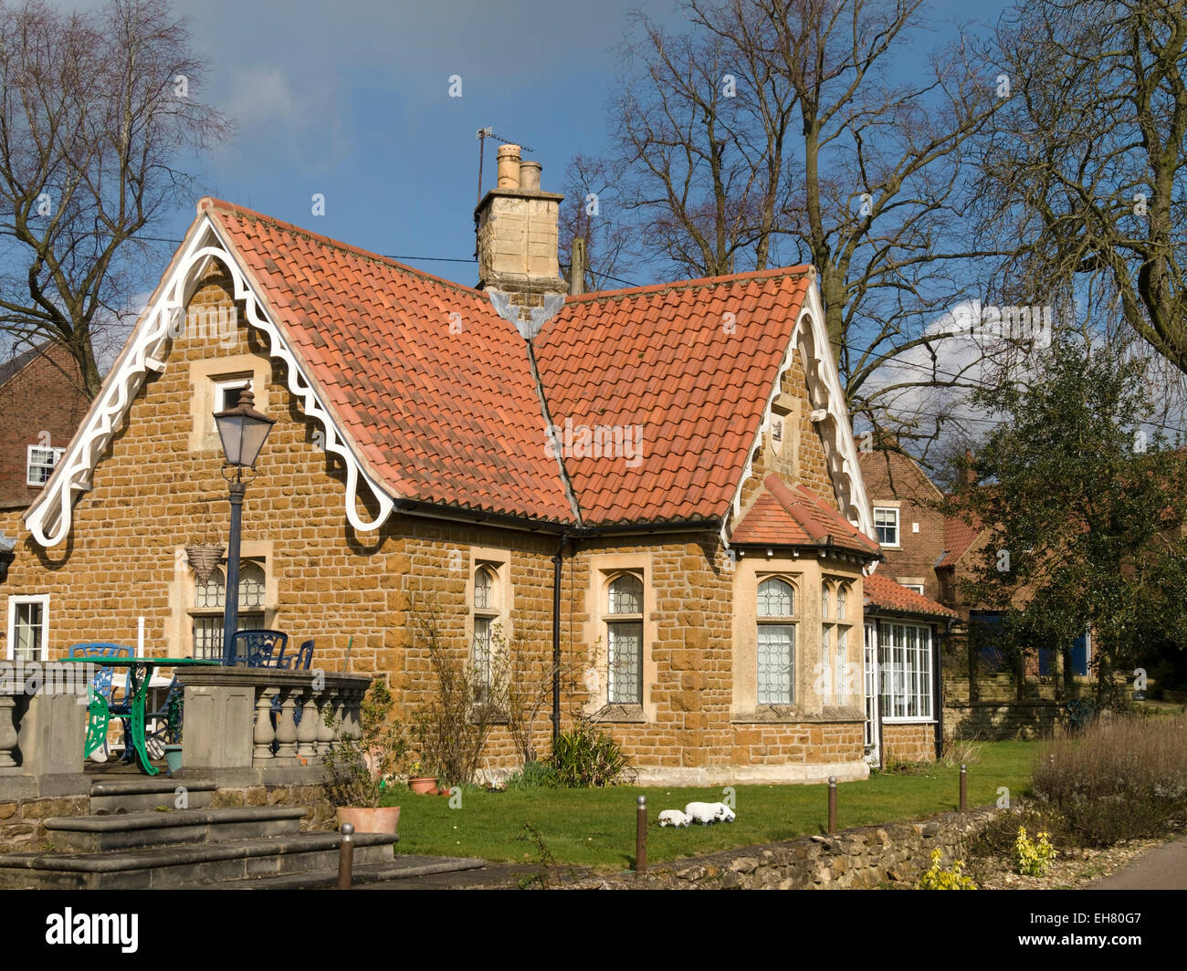 Old Lodge House with white painted ornate carved wooden gables, Burton ...