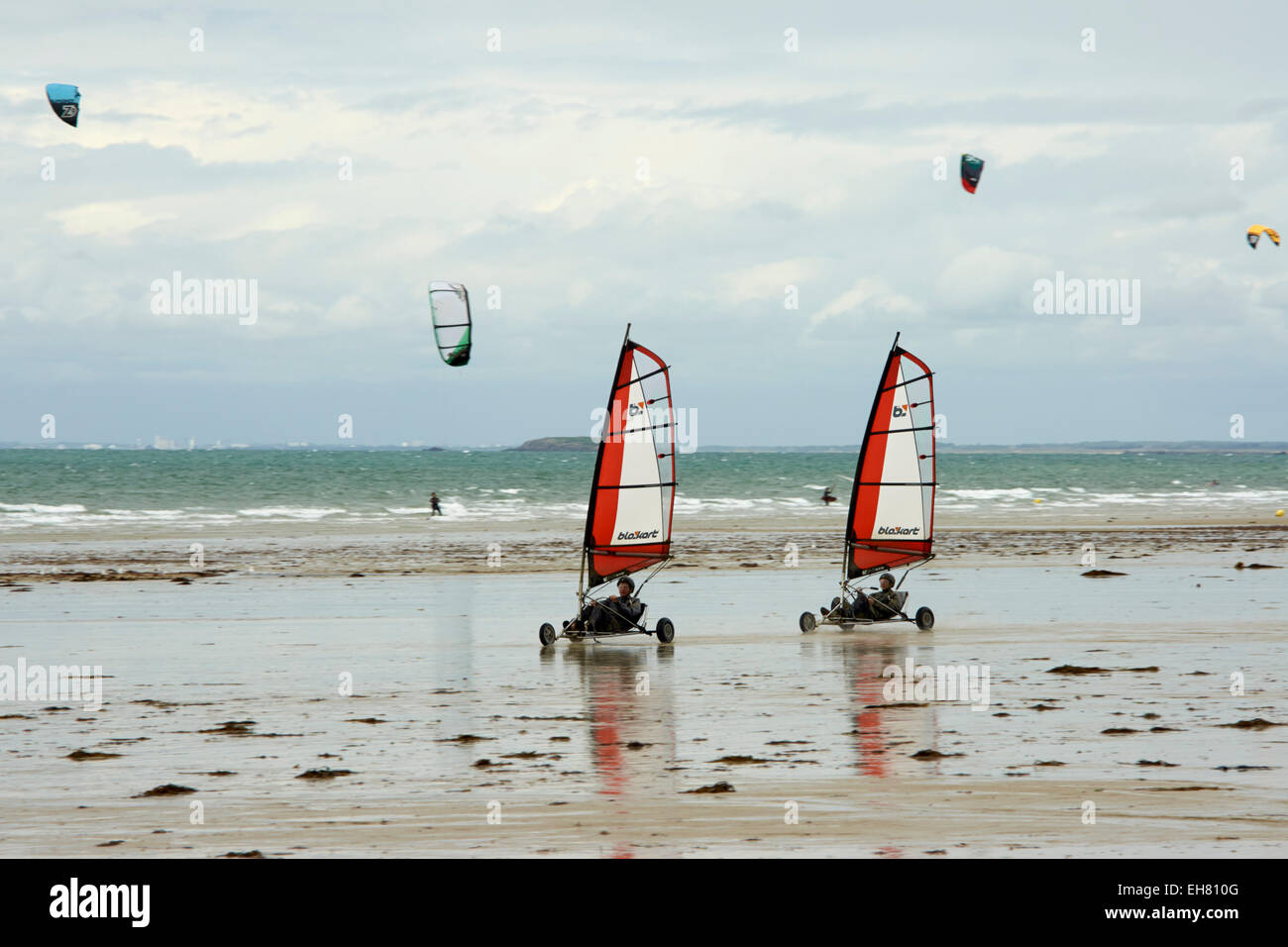 France, Quiberon pair of land sailing craft moving right to left ...