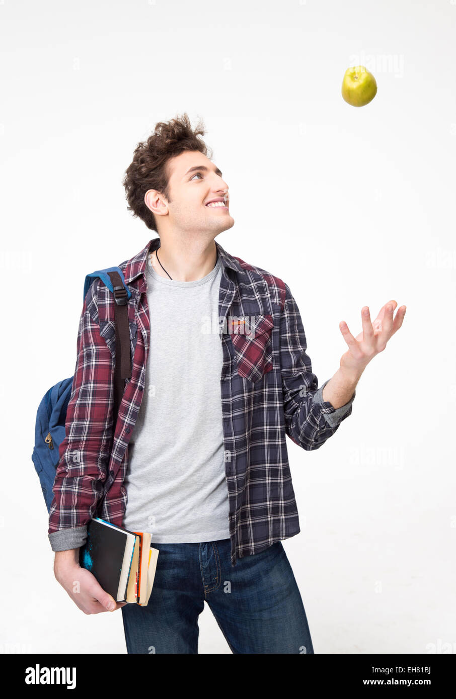 Portrait of young man with an apple hi-res stock photography and images ...