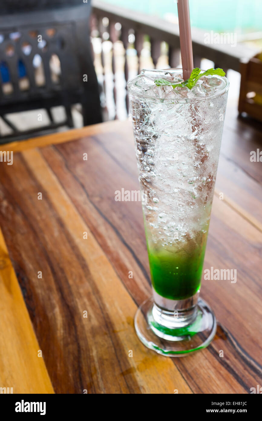 mint soda fresh cold drink soda water ice cubes in glass peppermint on ...