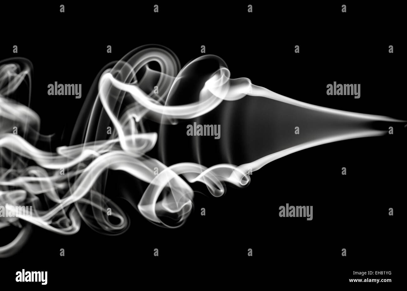 Abstract white pattern: smoke swirls and curves on black Stock Photo ...