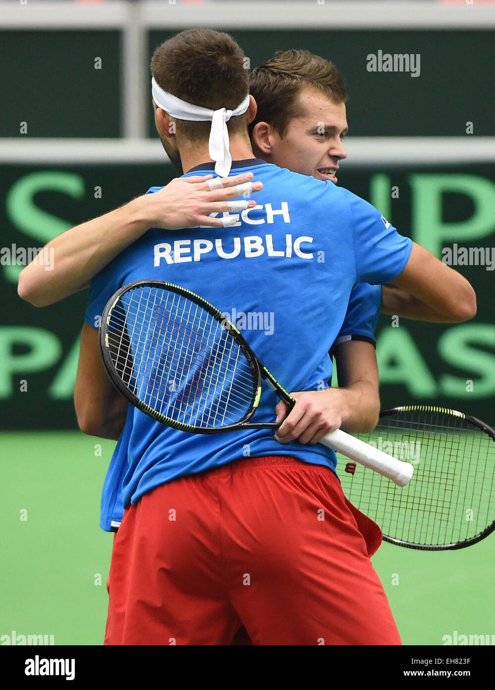 Ostrava, Czech Republic. 7th Mar, 2015. Adam Pavlasek (right) hugs his ...