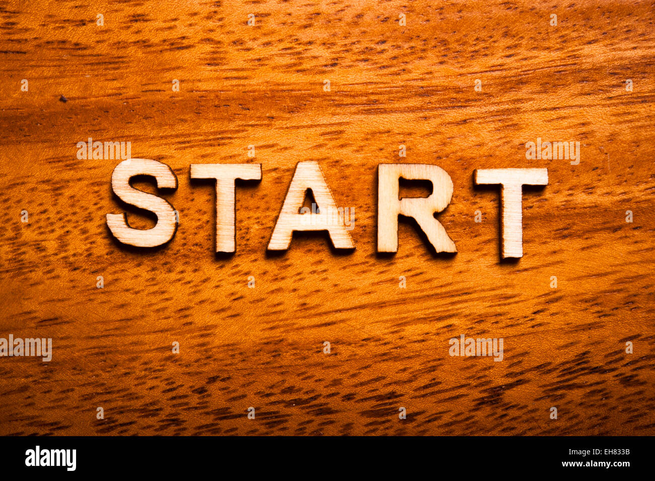 word start written with wooden letters Stock Photo - Alamy