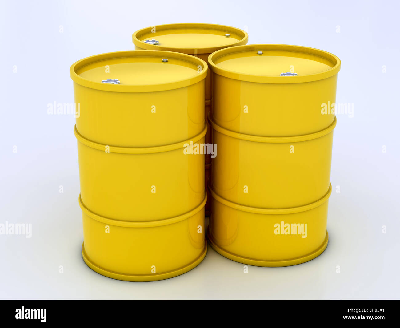 chemical yellow barrels on a white background Stock Photo - Alamy
