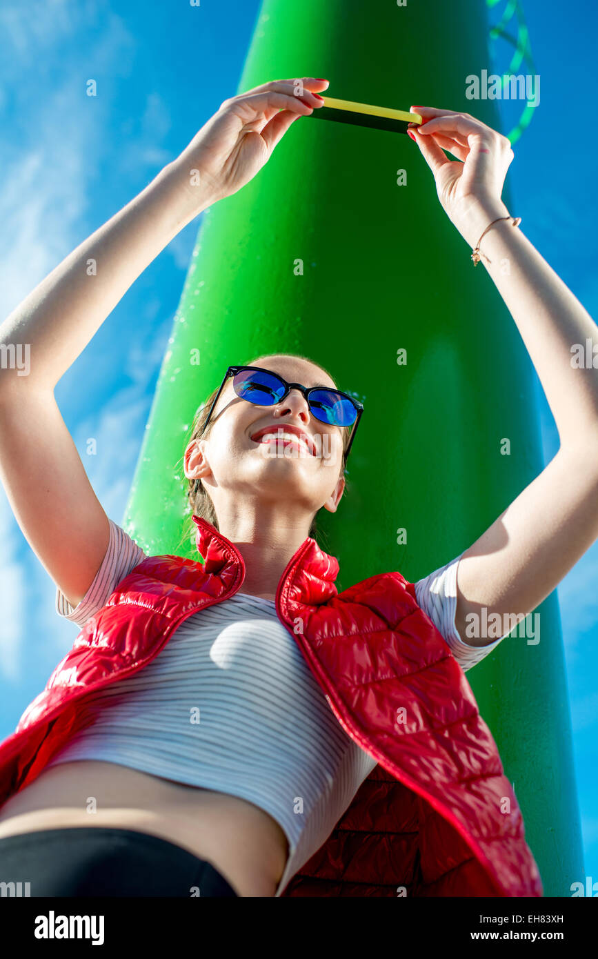 Sport woman with phone Stock Photo - Alamy
