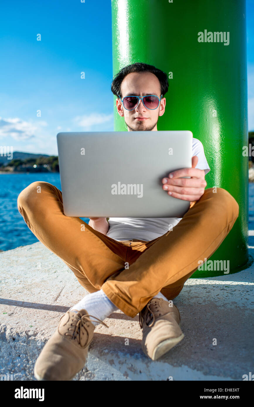 Man with laptop Stock Photo - Alamy