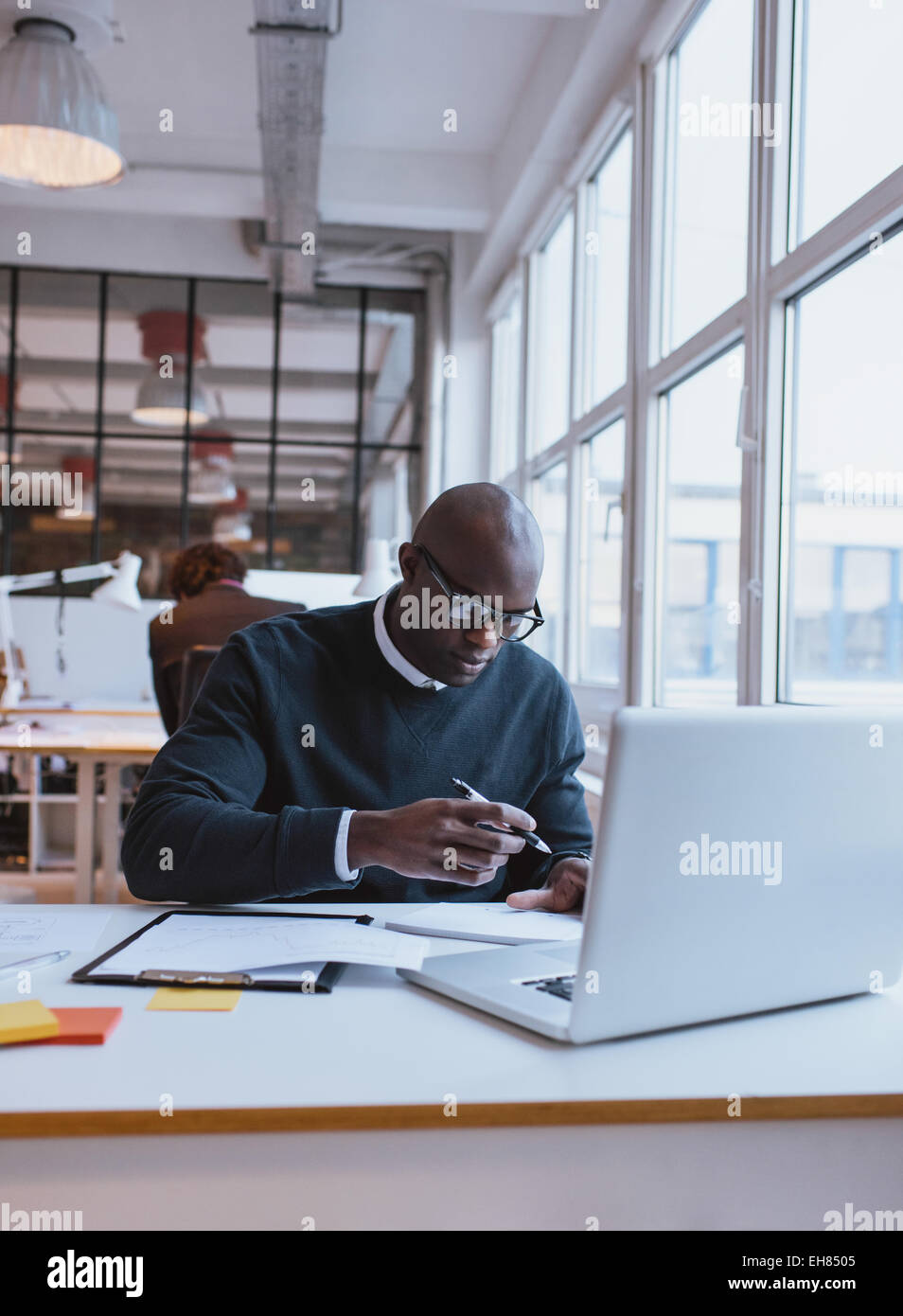 Working at the office hi-res stock photography and images - Alamy
