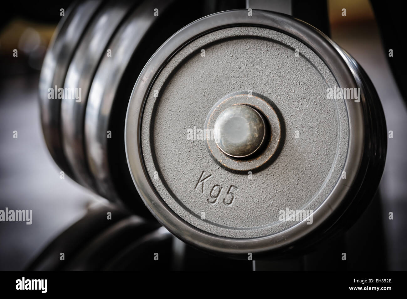 Barbell plates rack Stock Photo - Alamy
