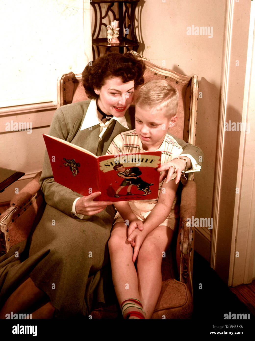 AVA GARDNER (1922-1990) US Film actress with unidentified child about ...
