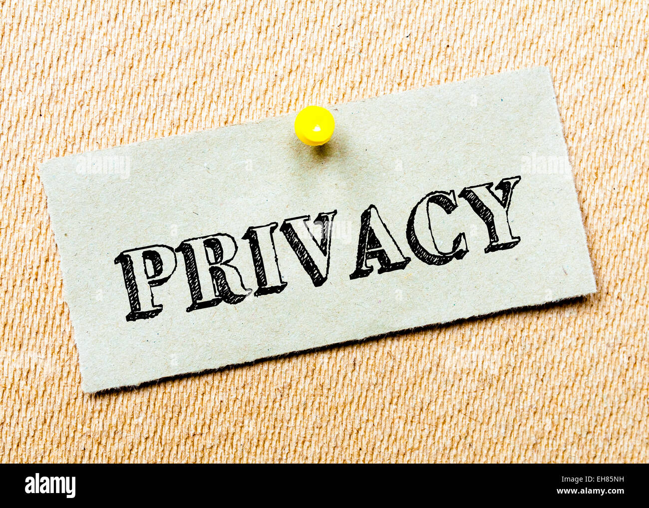 Recycled paper note pinned on cork board.Privacy Message. Concept Image ...