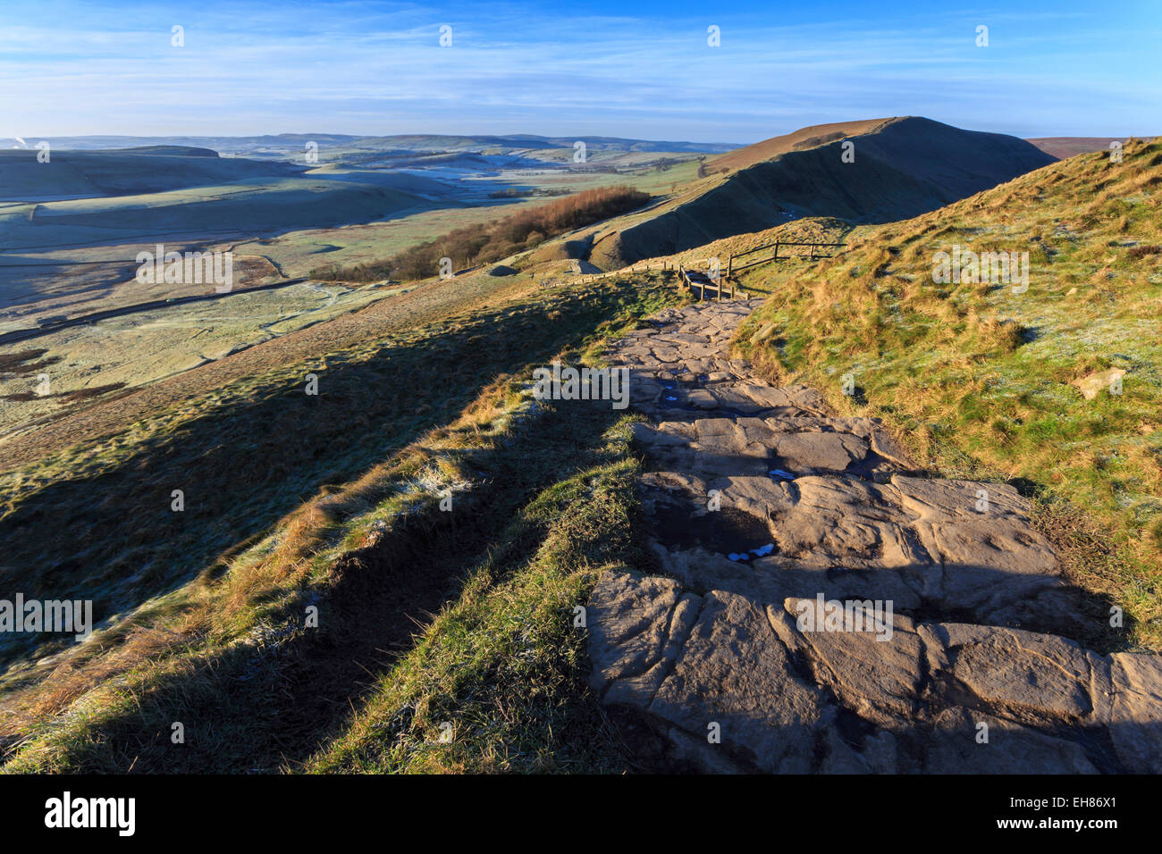 Steps up Mam Tor, view towards Rushup Edge, distant fields and hills in ...