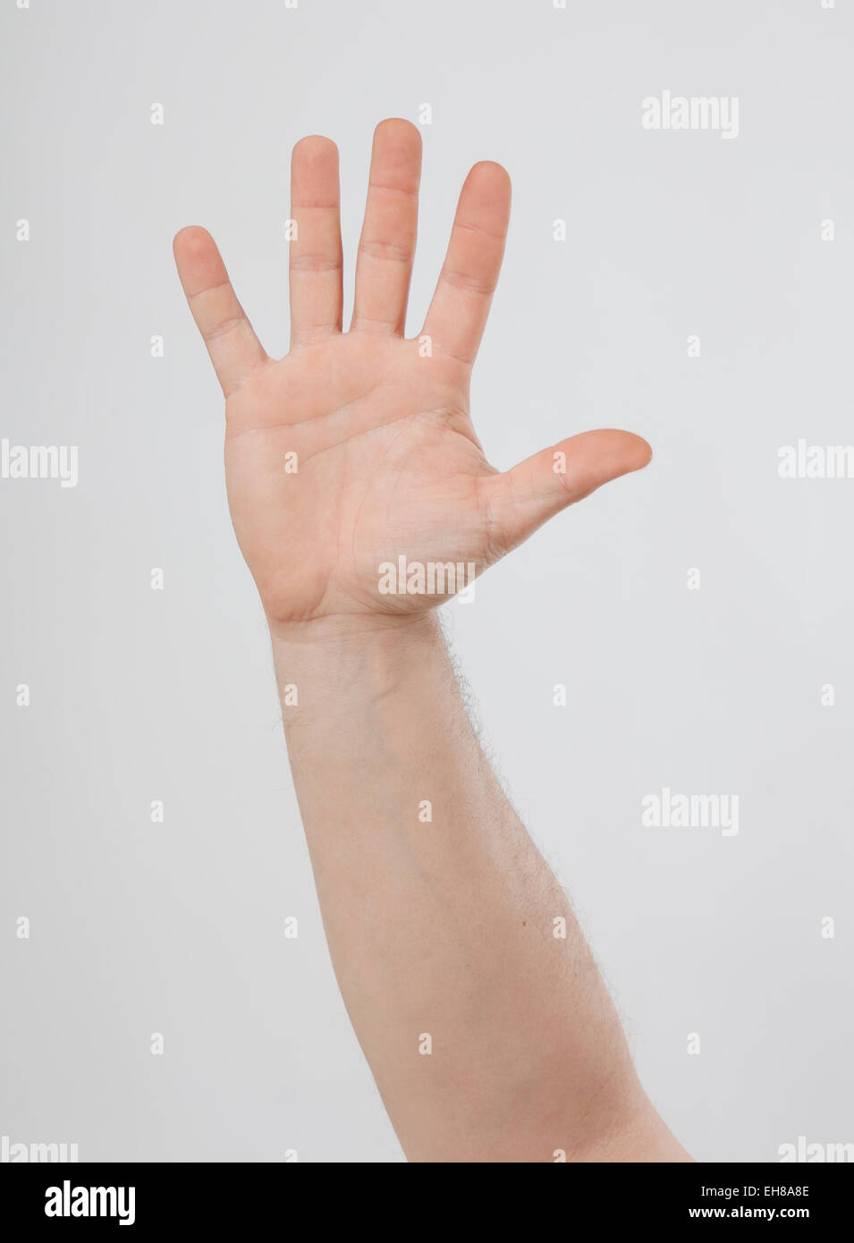 an open hand is stretched in the air Stock Photo - Alamy