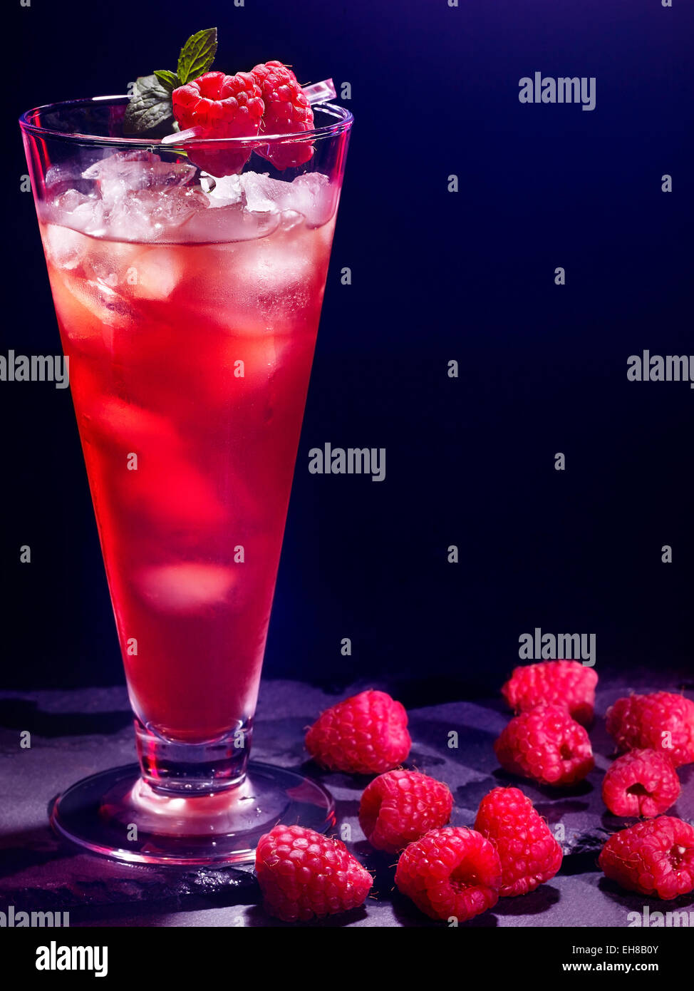 Red raspberry cocktail on dark background 7 Stock Photo - Alamy