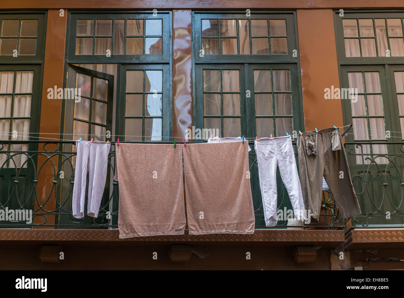 Porto, laundry drying outside windows of old city house Stock Photo - Alamy