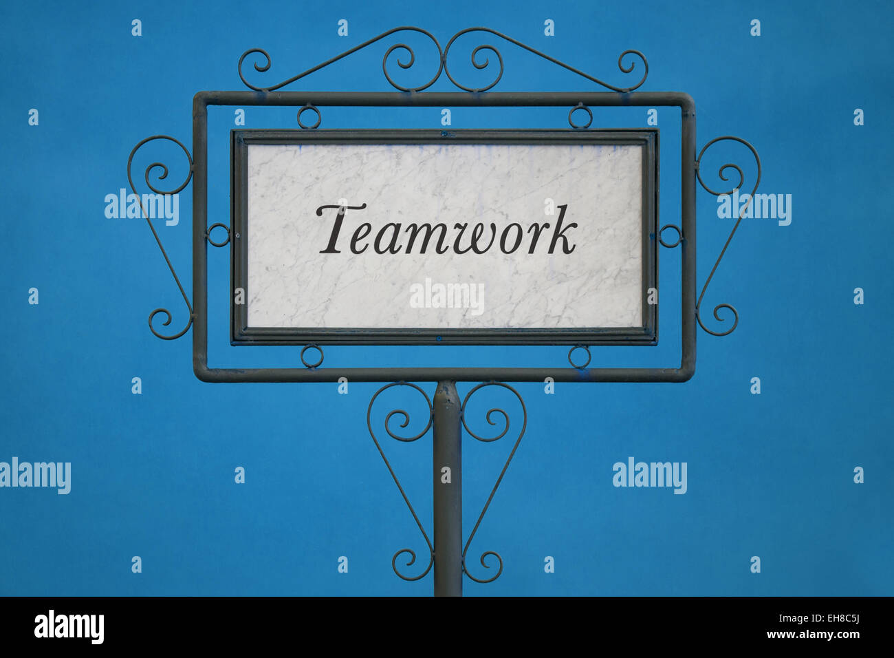 The Word "Teamwork" on a Signboard. Blue Background Stock Photo - Alamy