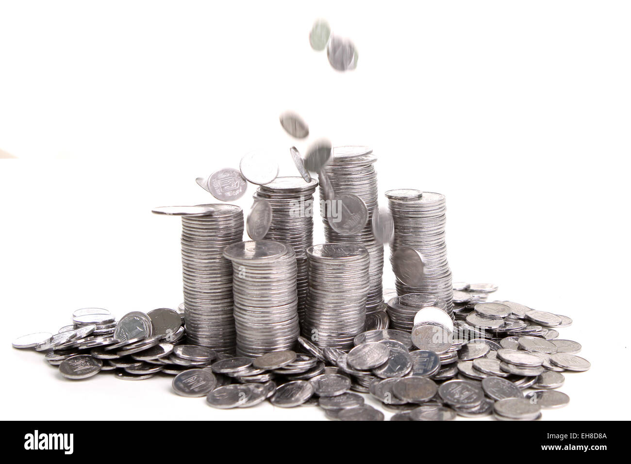 stack of coins isolated on a white background Stock Photo - Alamy