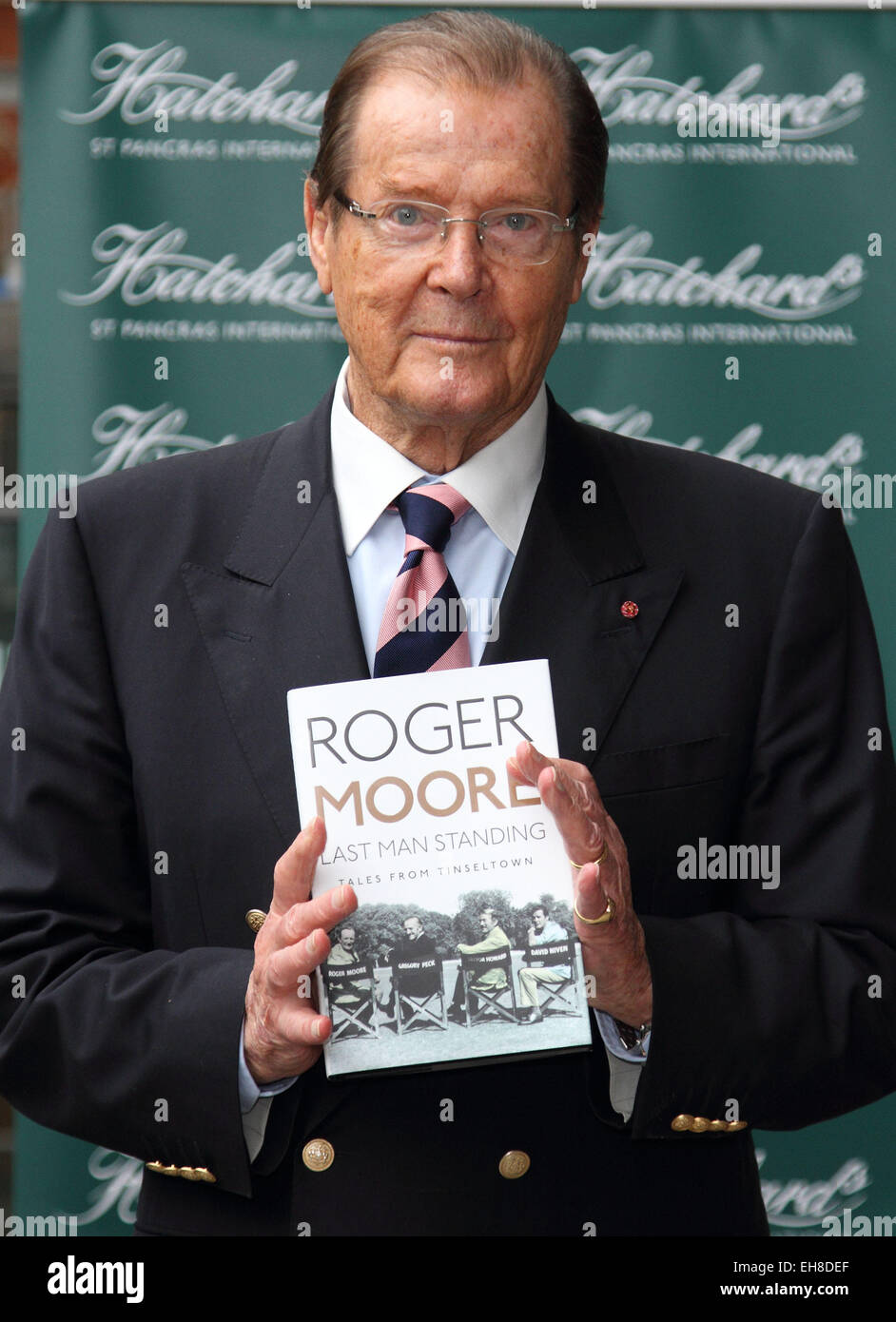 Sir Roger Moore signs copies of his autobiography 'Last Man Standing ...