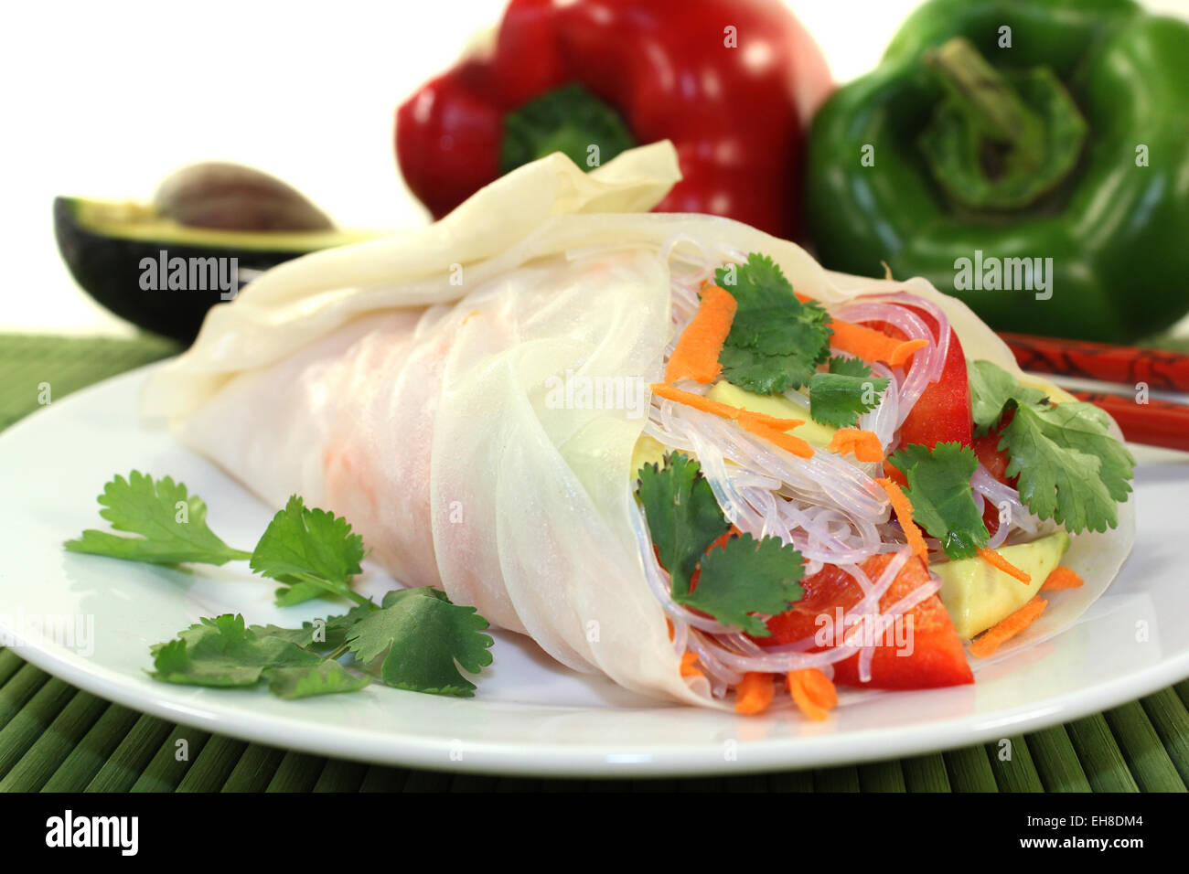 Rice paper stuffed with glass noodles, carrots, peppers and cilantro ...