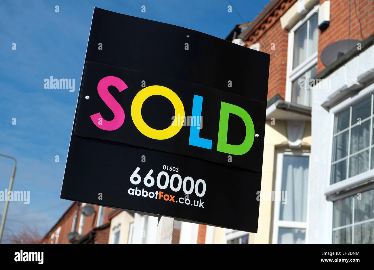 estate agents sold board agency sign Stock Photo - Alamy