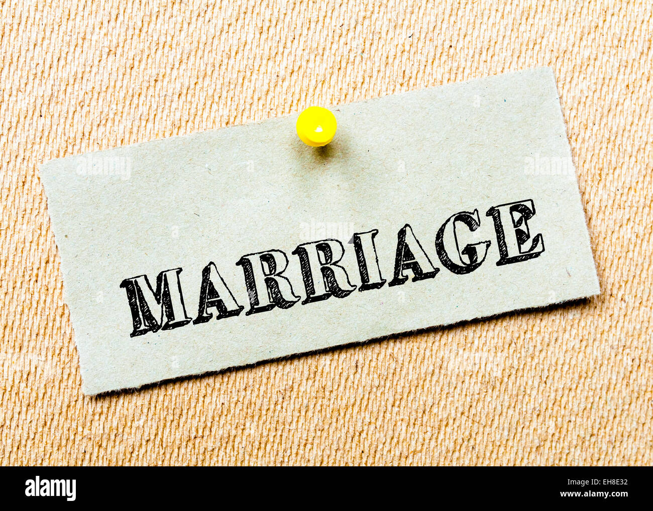 Recycled paper note pinned on cork board.Marriage Message. Concept ...