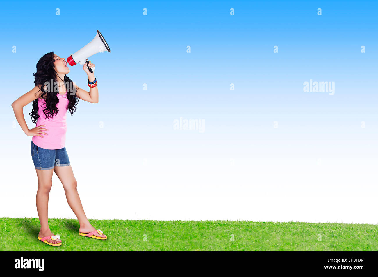 1 indian Young girl Teenager park Bullhorn Shouting Stock Photo - Alamy