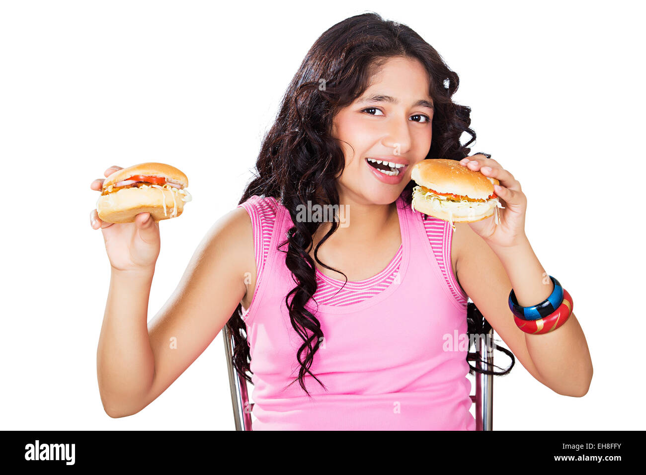 1 indian Young girl Teenager Delicious Burger Eating Stock Photo - Alamy