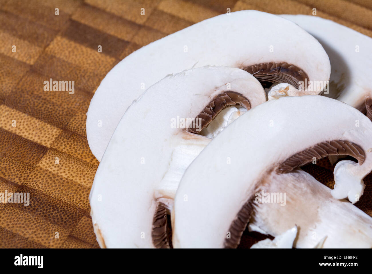Sliced mushrooms on a cooking board Stock Photo - Alamy